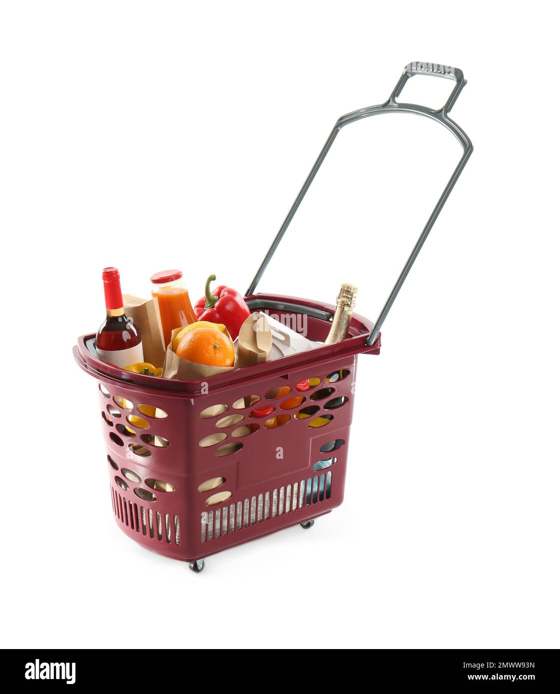 Shopping basket full of different products isolated on white Stock ...
