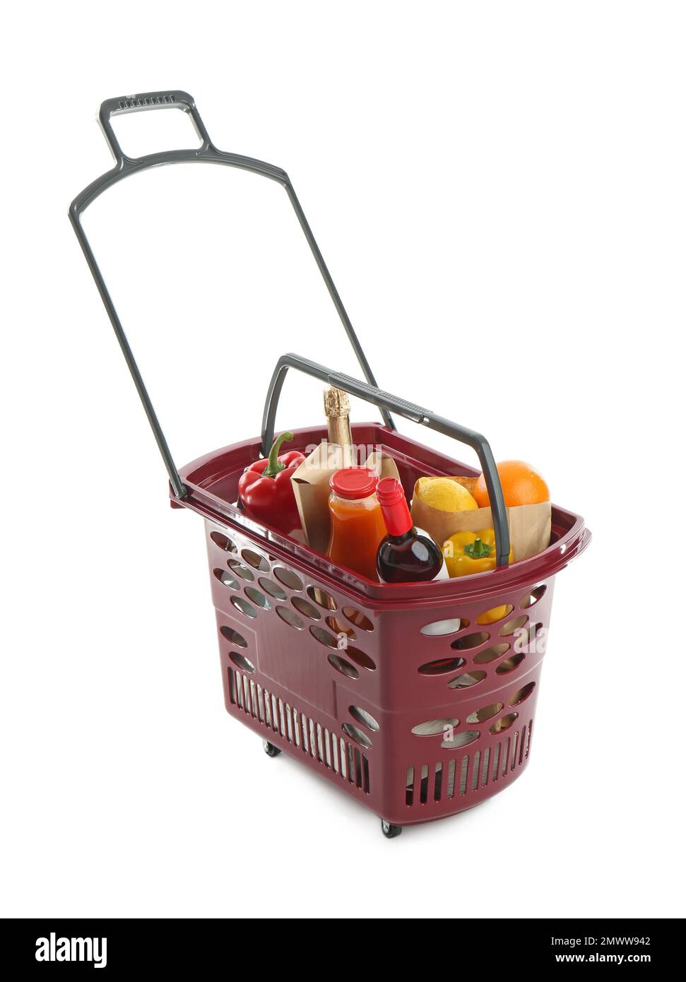 Shopping basket full of different products isolated on white Stock ...