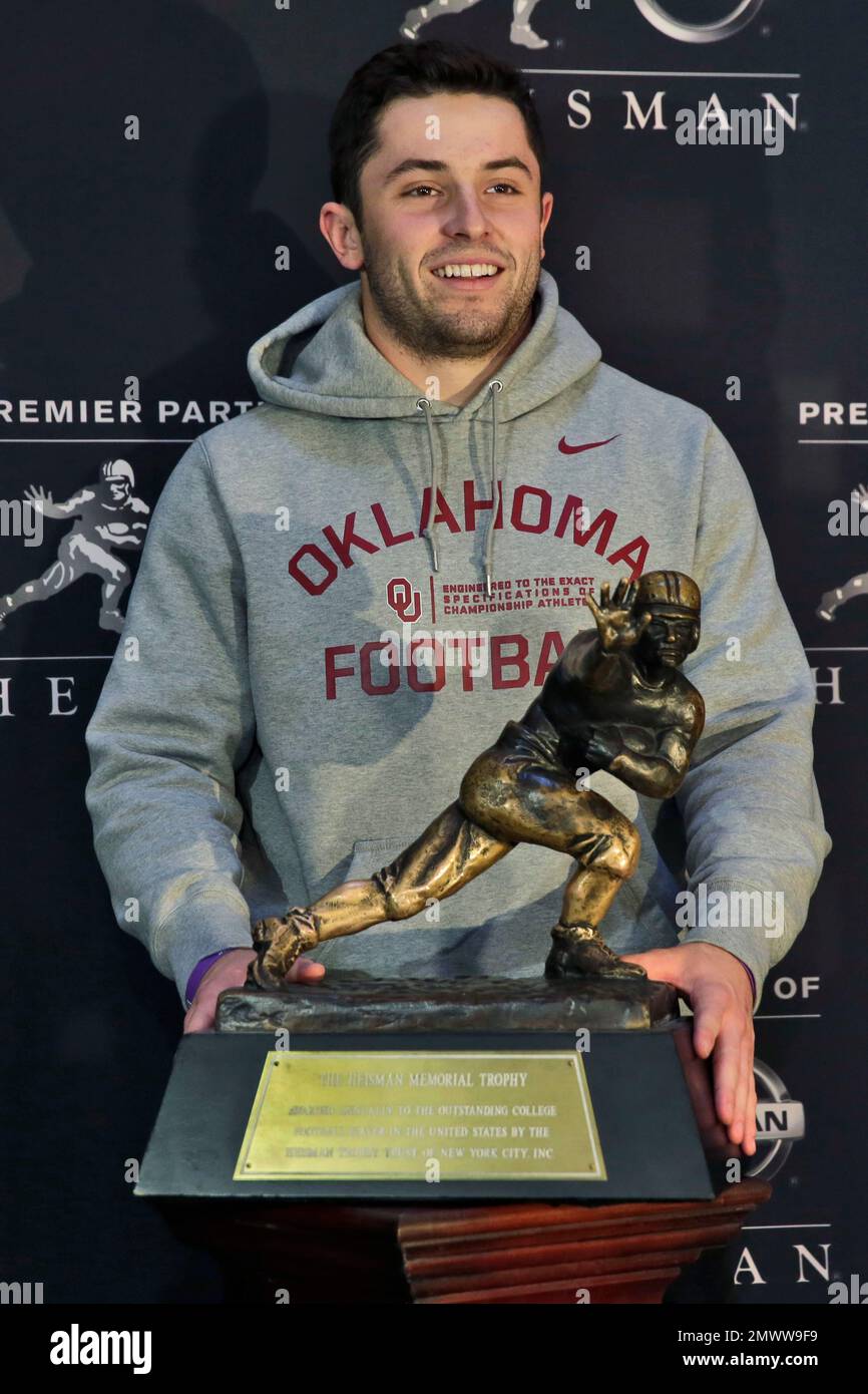 Heisman Trophy finalist from Oklahoma Baker Mayfield poses with the ... Heisman Trophy finalist from Oklahoma Baker Mayfield poses with the ...