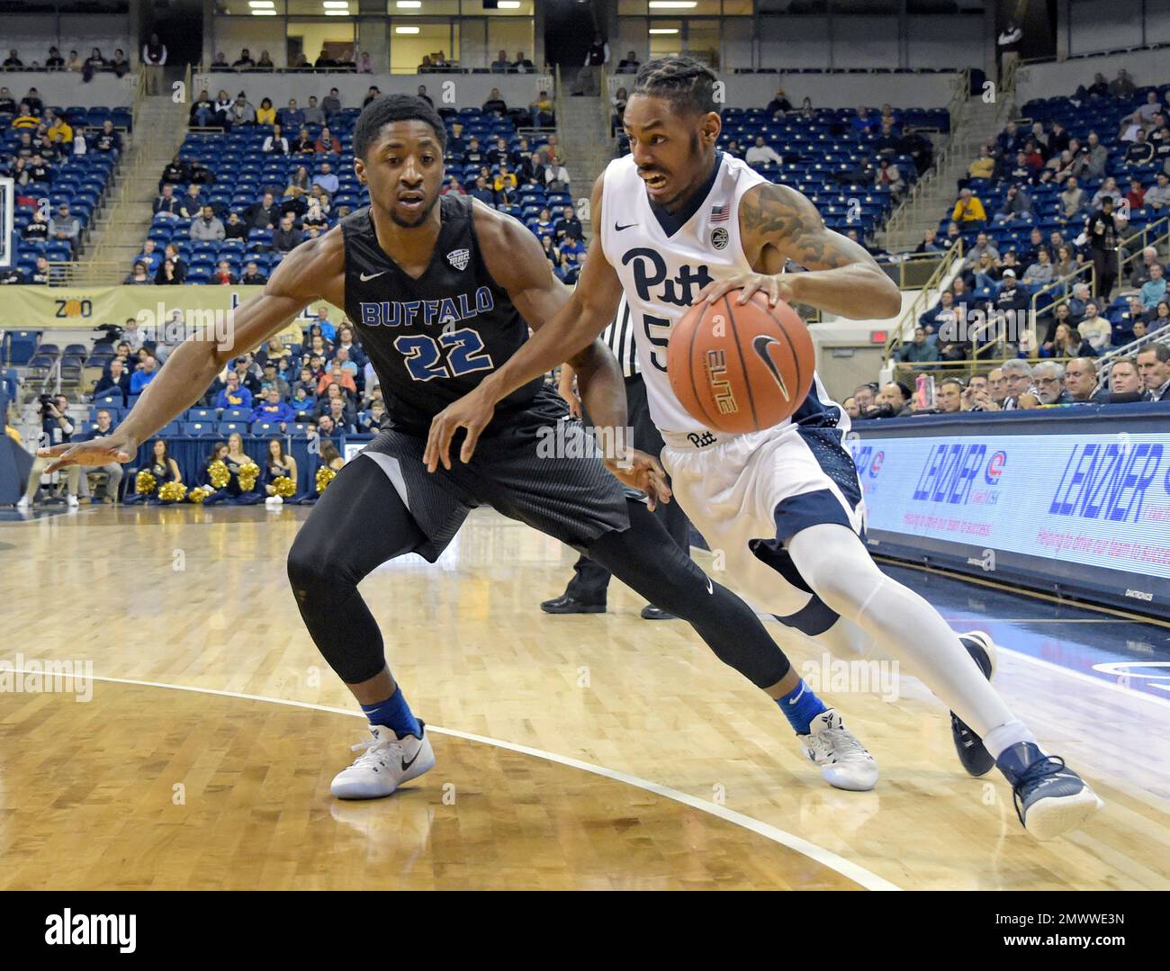 Pittsburgh guard Jonathan Milligan (55) drives around Buffalo guard ...