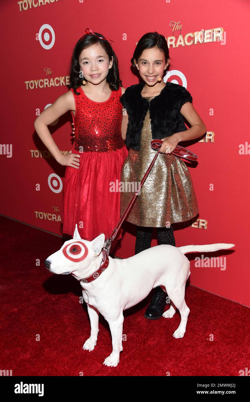 Actors Isabella Russo, left, and Kylie Cantrall pose with Bullseye the ...