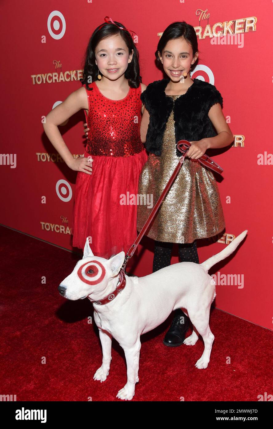 Actors Isabella Russo, left, and Kylie Cantrall pose with Bullseye the ...