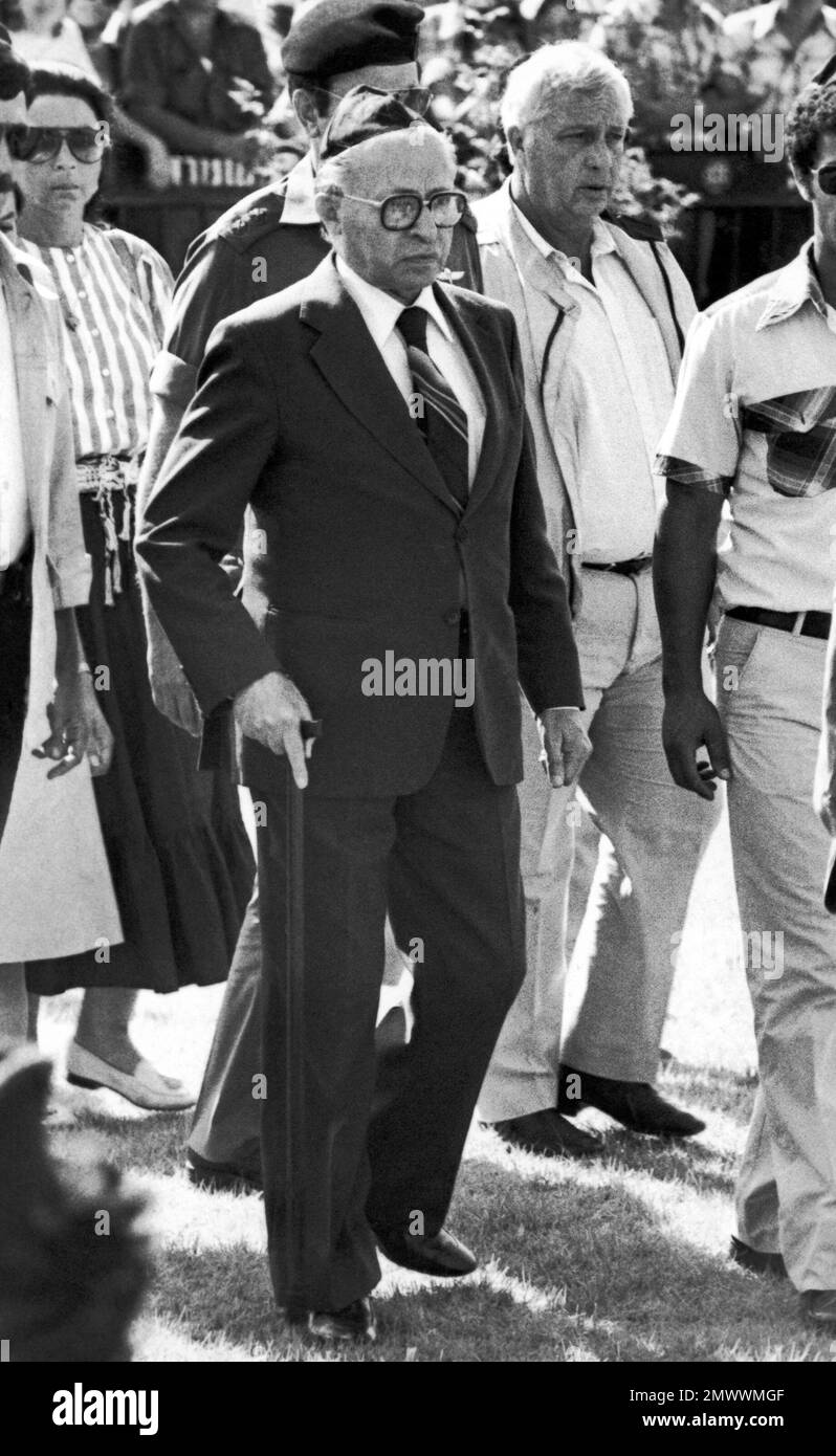 Israeli Prime Minister Menachem Begin, walking with the help of a cane ...