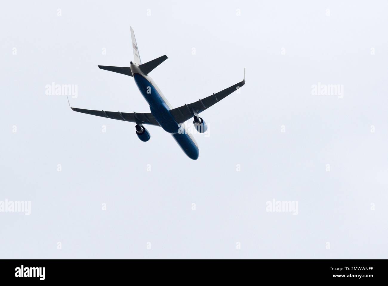 An airplane flies over during burial services for former presidential ...