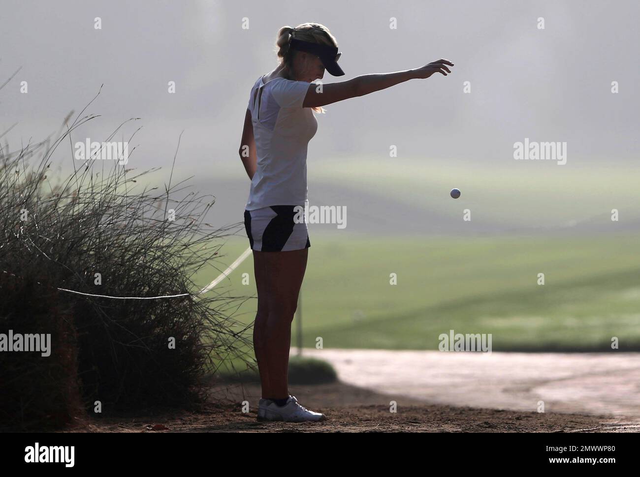Paige Spiranac of the U.S. drops her ball on the 10th hole during the ...