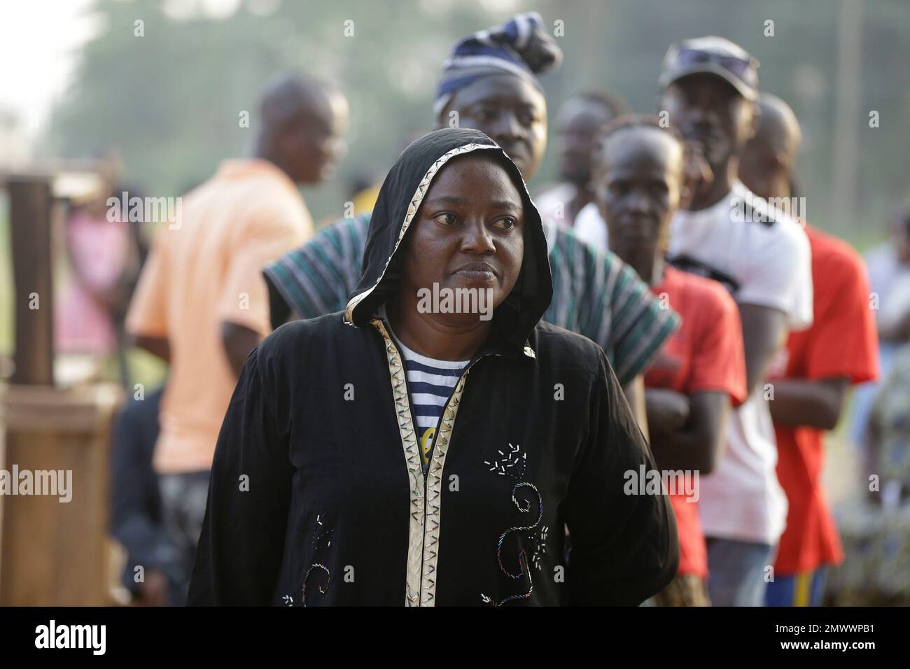 Ghanians wait to vote in Kyebi, eastern Ghana, Wednesday, Dec. 7, 2016 ...