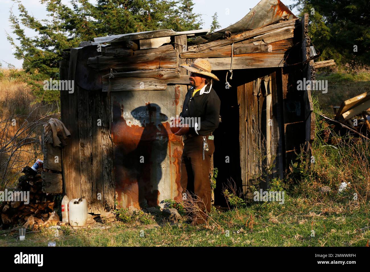 In this Nov. 30, 2016 photo, pulque producer Antonio Gomez speaks ...