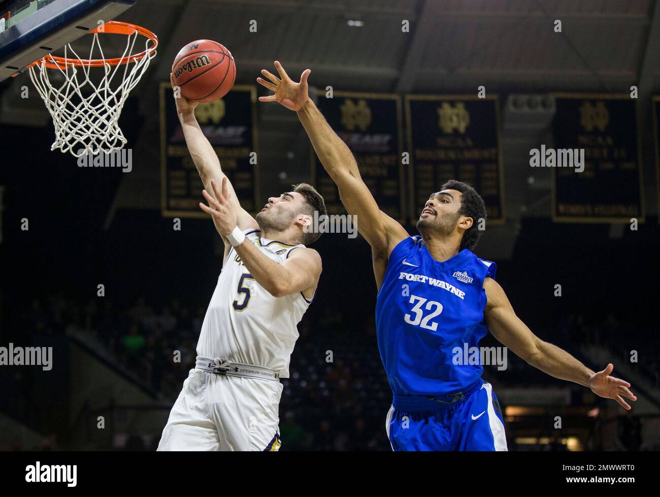 Notre Dame's Matt Farrell (5) goes in for a layup in front of IPFW's ...