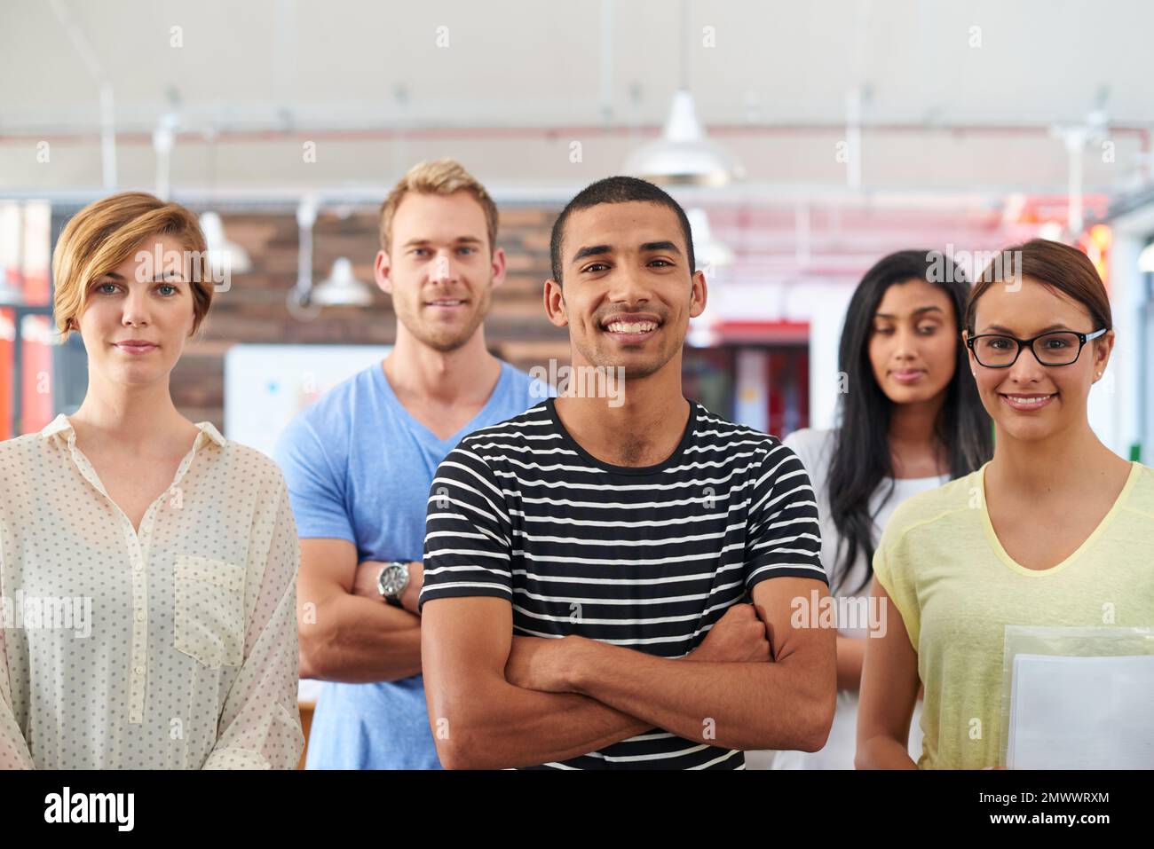 Casual but always professional. Portrait of a team of confident ...