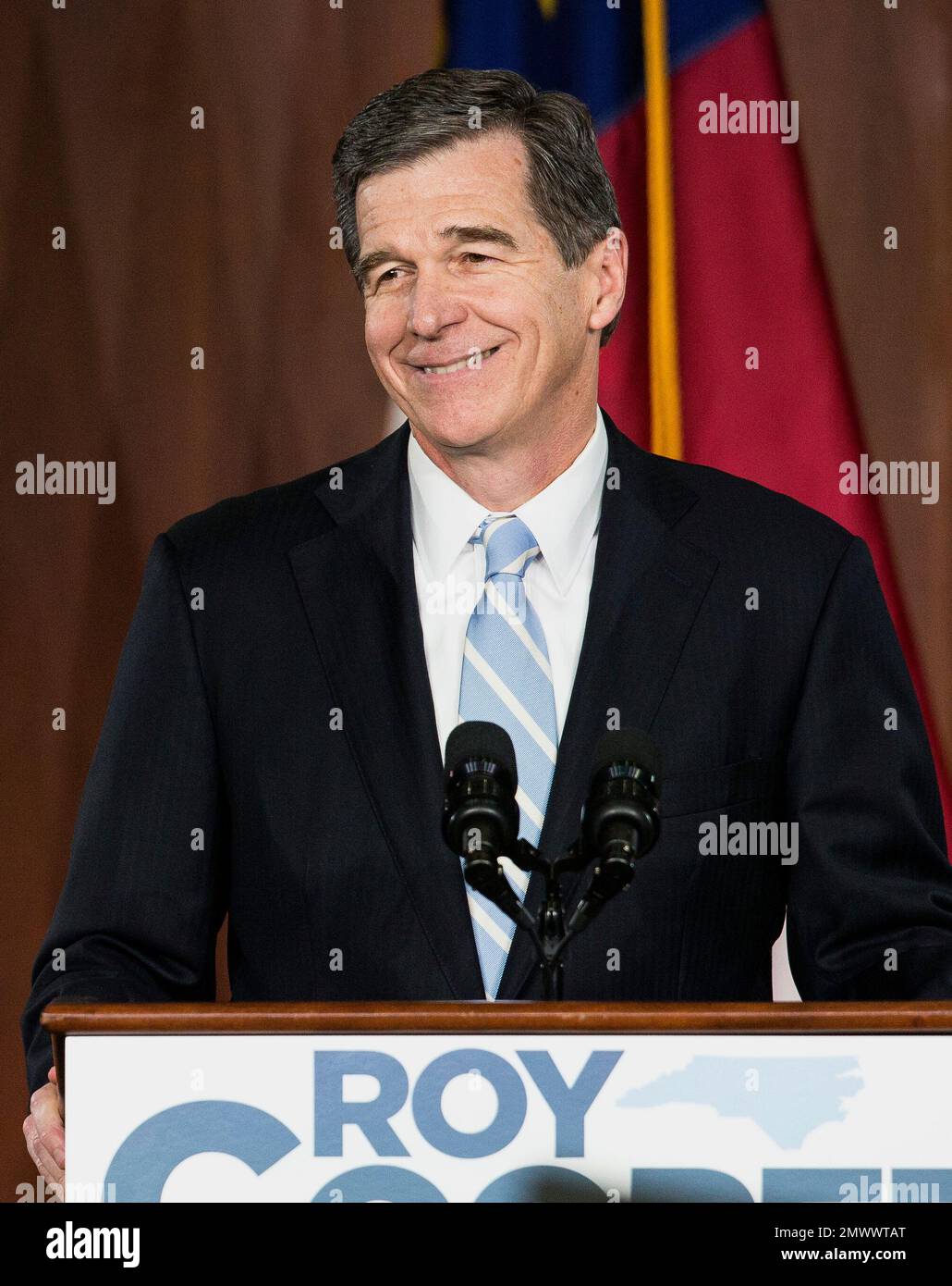 North Carolina Gov.-elect Roy Cooper speaks to a crowd of supporters a ...