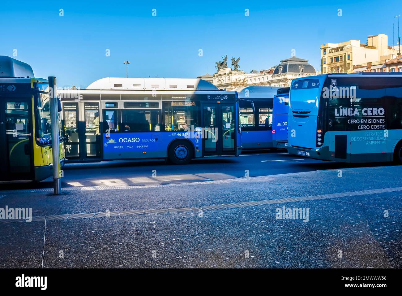 A view of EMT blue buses waiting at Atocha bus terminus, Madrid Spain ...