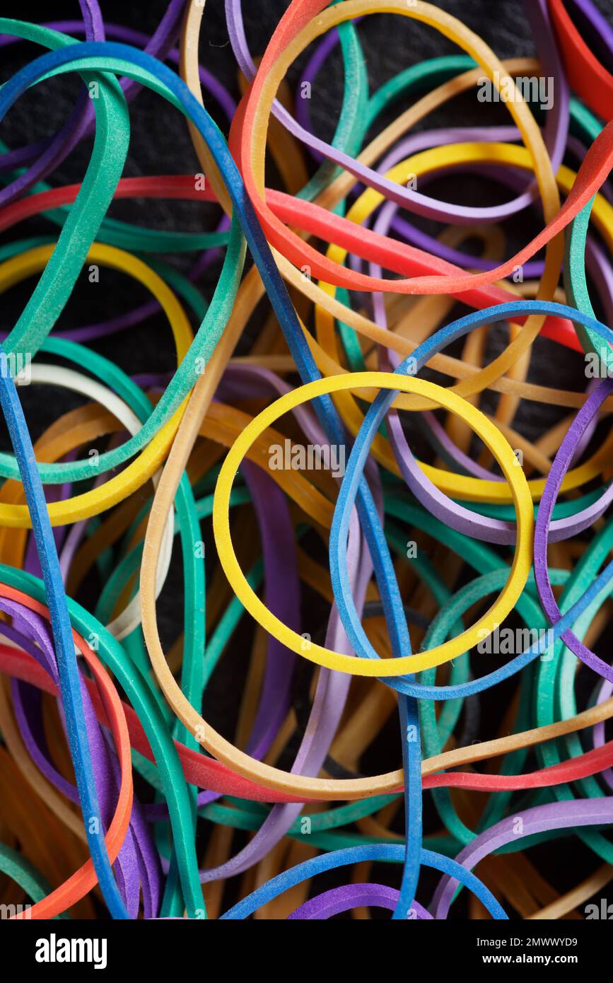 Colorful group of messy elastic rubber bands Stock Photo - Alamy