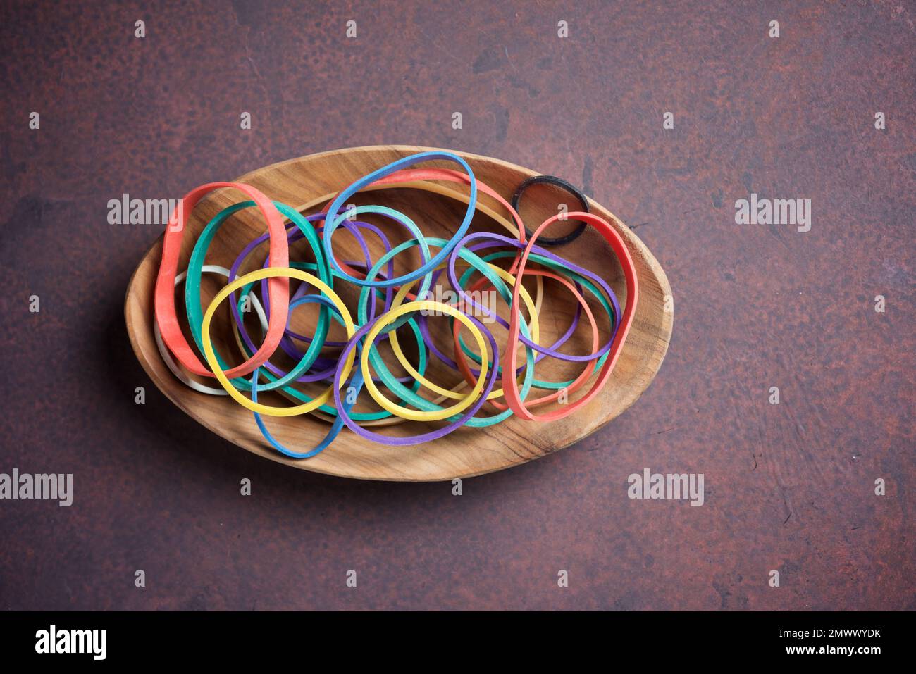 Colorful elastic rubber bands on a small tray Stock Photo - Alamy