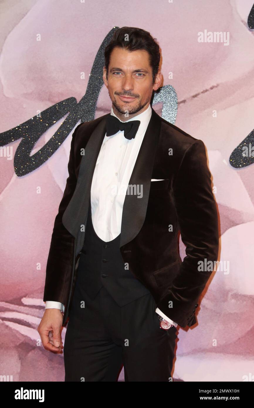 David Gandy poses for photographers at the Fashion Awards in London ...