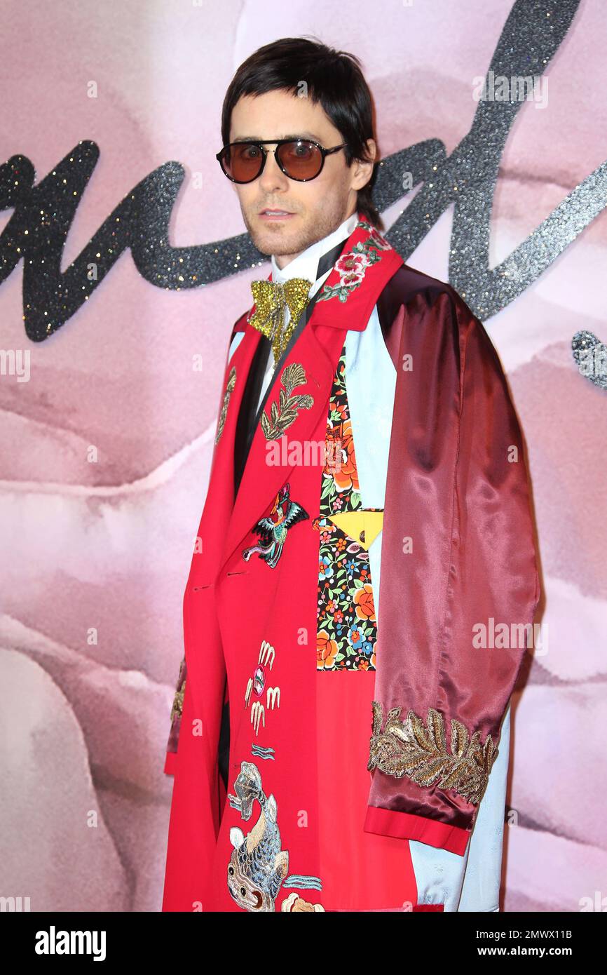 Jared Leto poses for photographers at the Fashion Awards in London ...