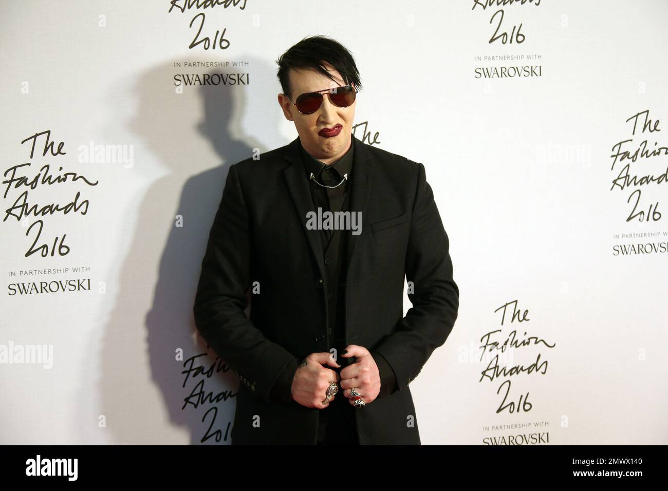 Marilyn Manson poses for photographers at the Fashion Awards in London ...