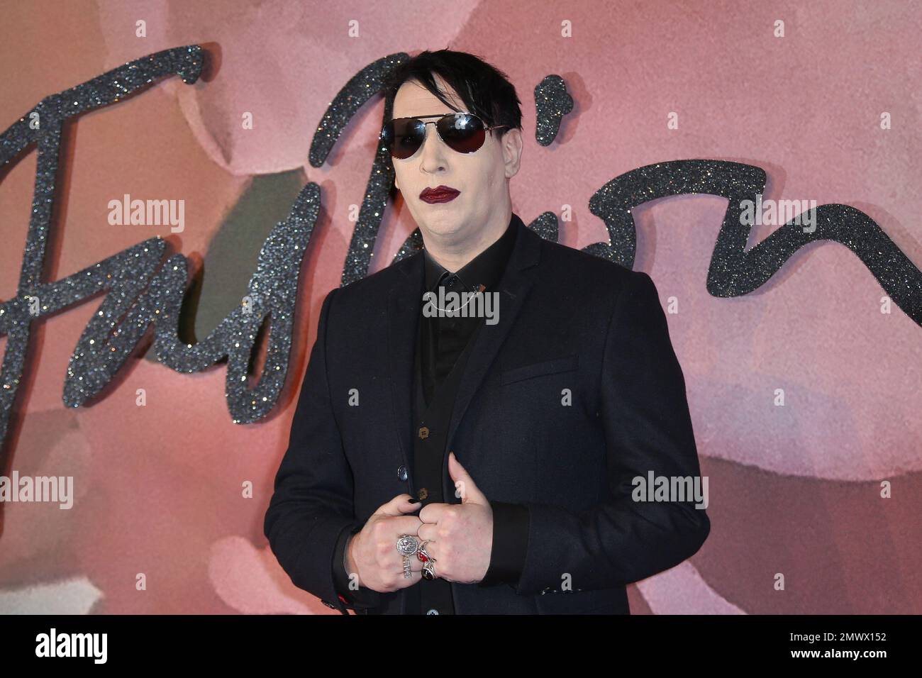 Marilyn Manson poses for photographers at the Fashion Awards in London ...