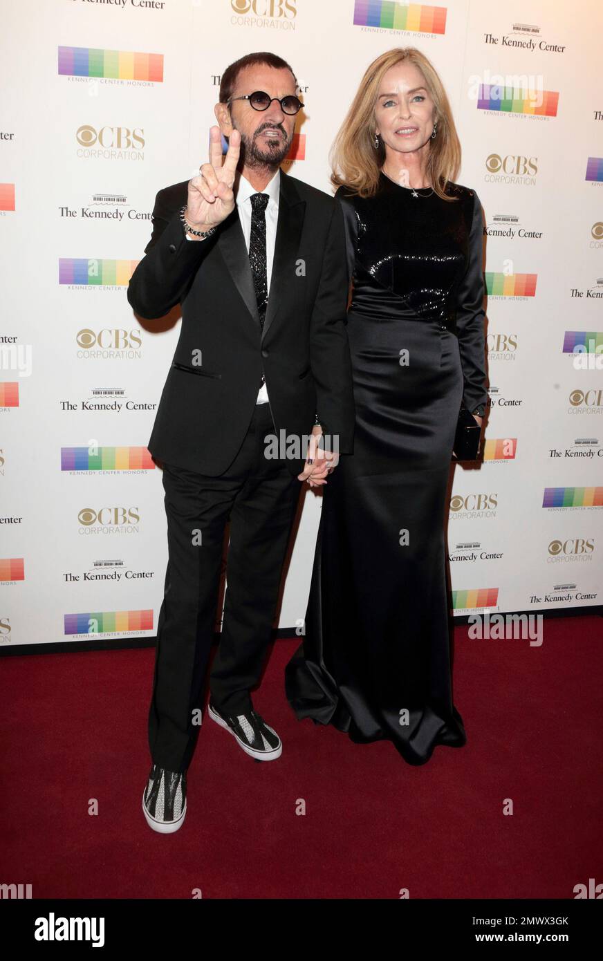 Ringo Starr of The Beatles, left, and his wife Barbara Bach attend the ...
