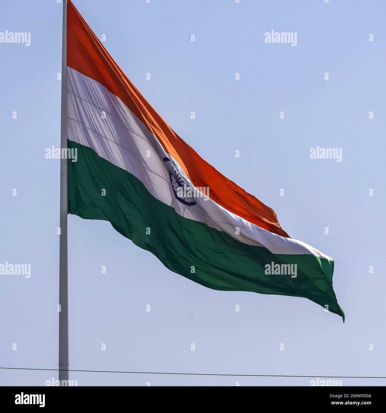 India flag flying high at Connaught Place with pride in blue sky, India ...