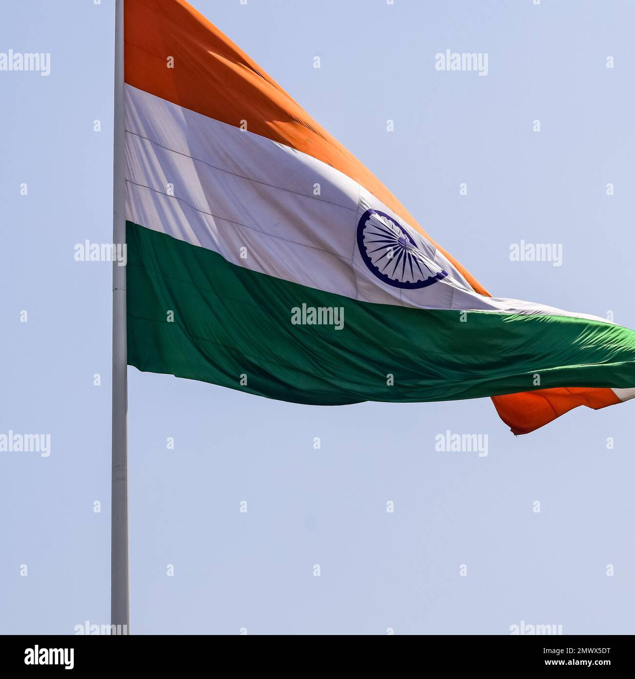 India flag flying high at Connaught Place with pride in blue sky, India ...