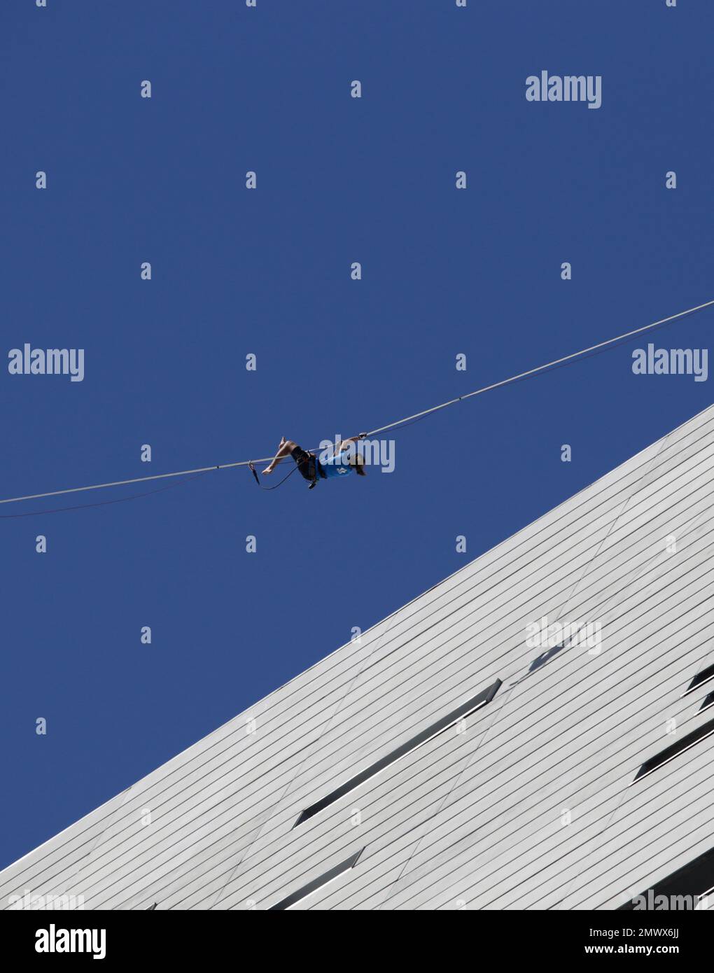 Alexander Schultz, from Germany, crosses Reforma Avenue on a high wire ...