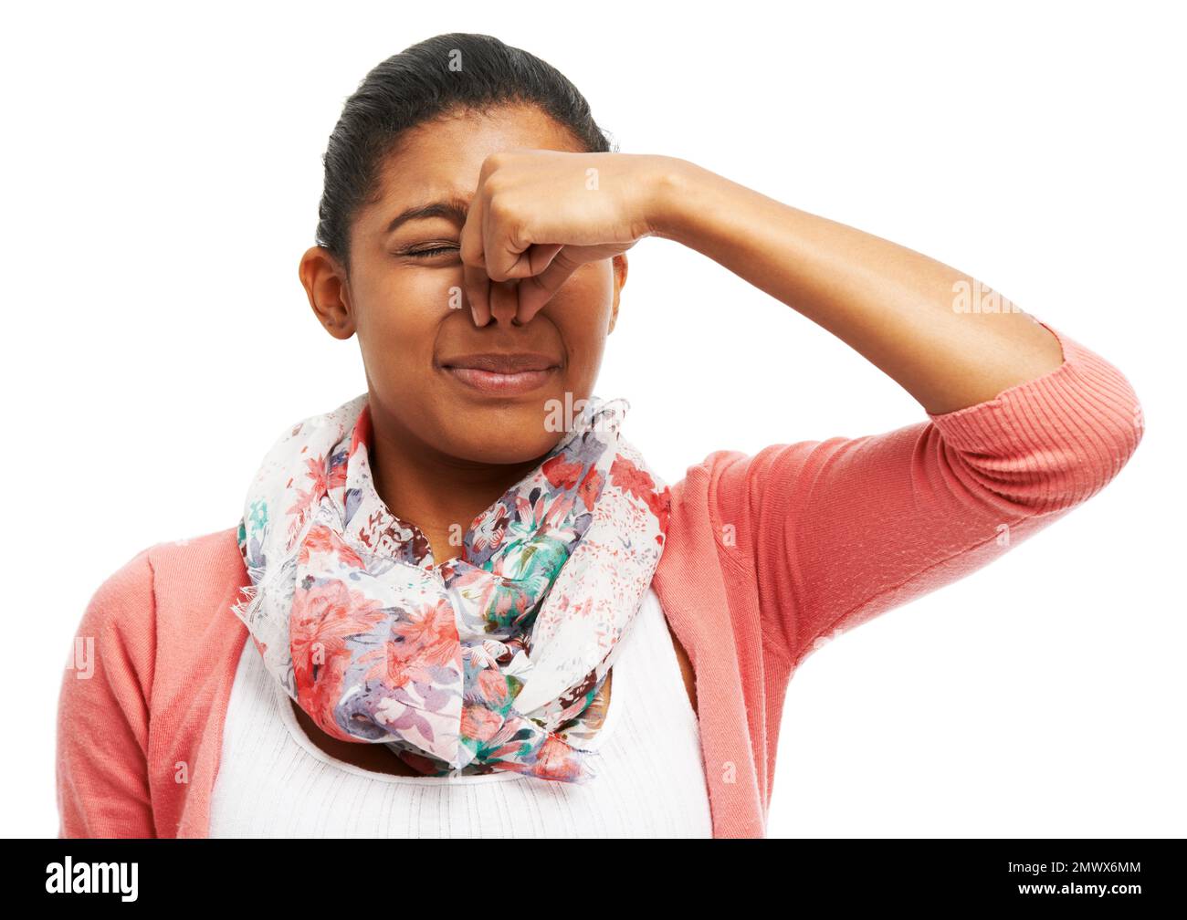 Unpleasant odours. A young woman holding her noise to block a horrid ...