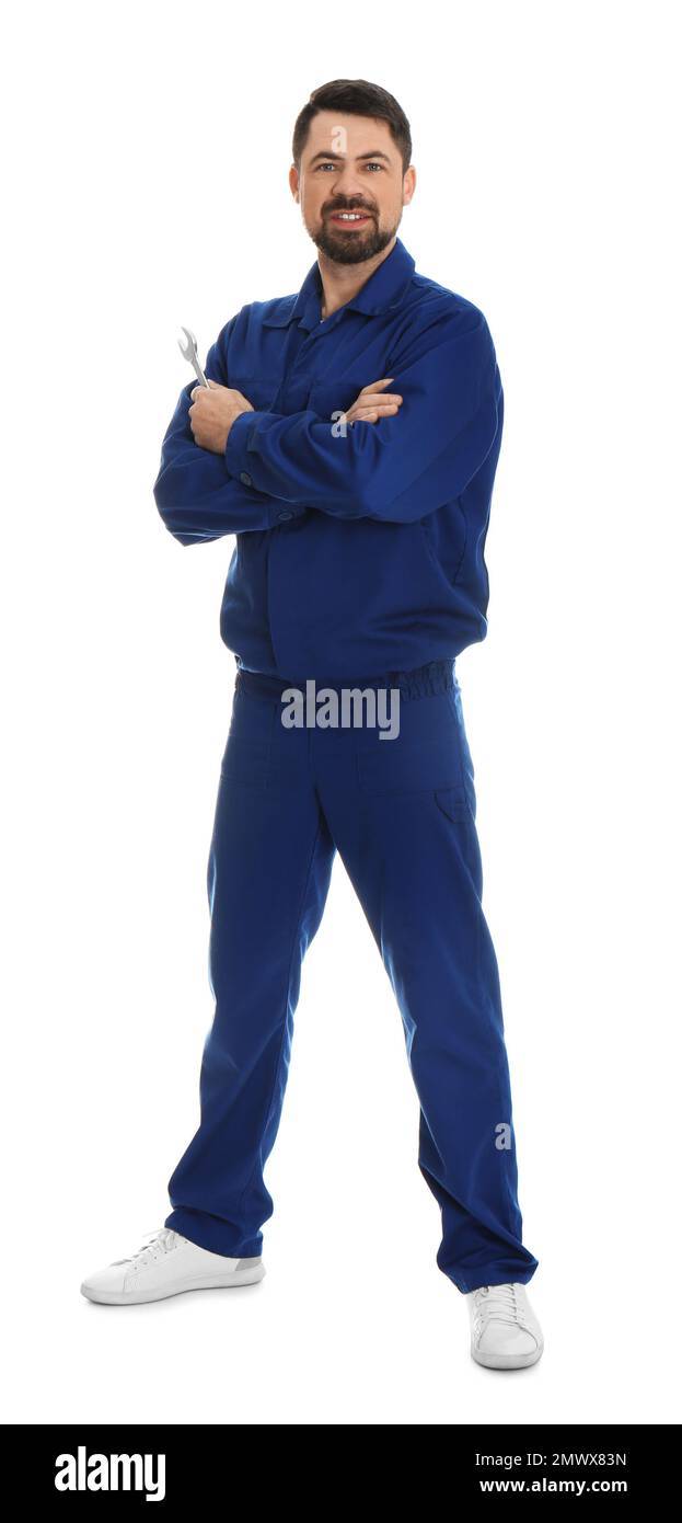 Full length portrait of professional auto mechanic with wrench on white ...