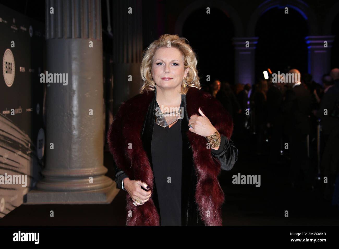 Actress Jennifer Saunders poses for photographers upon arrival at the ...