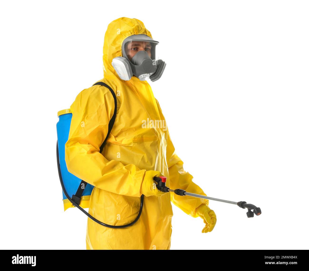 Man wearing protective suit with insecticide sprayer on white ...