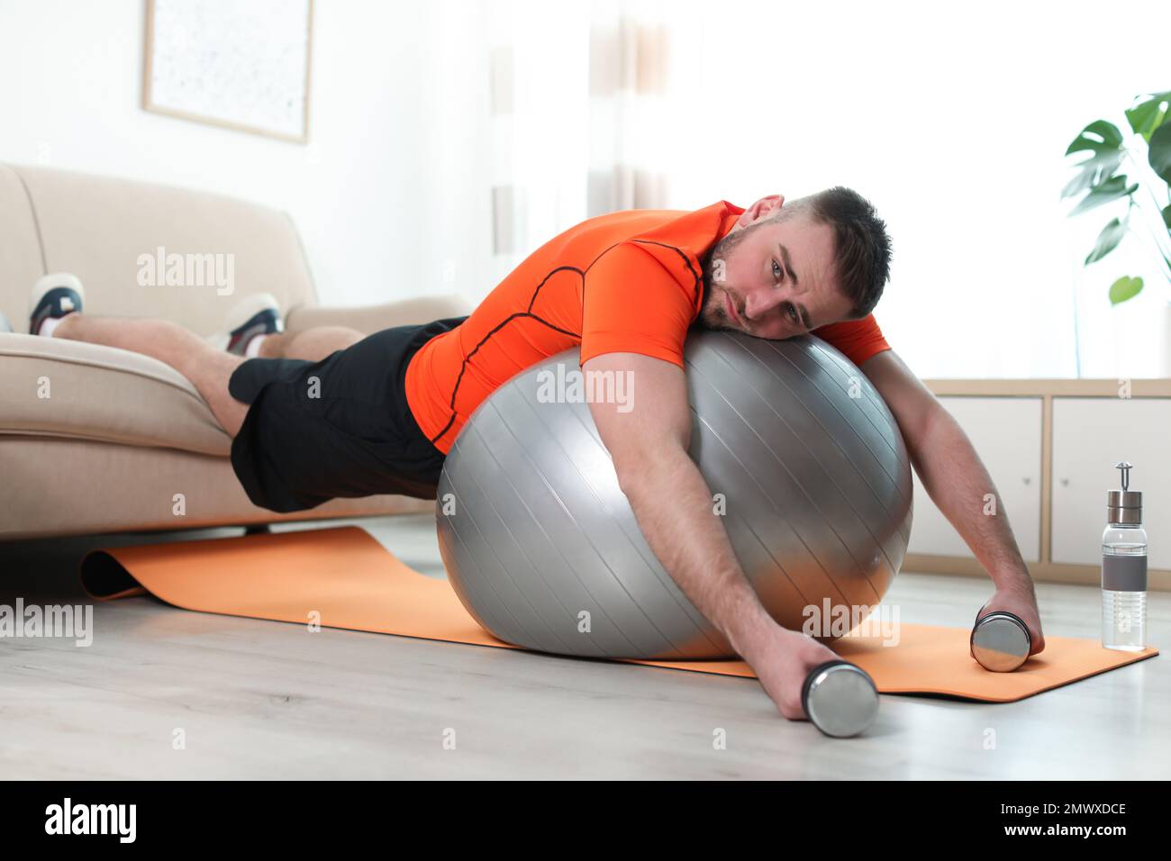 Lazy fat man hi-res stock photography and images - Alamy