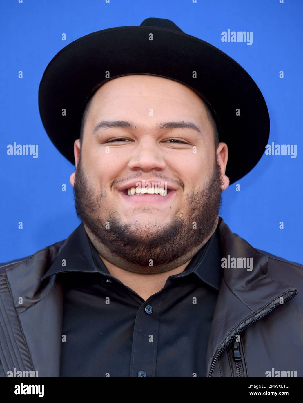 Christian Cuevas arrives at the world premiere of "Sing" at the ...