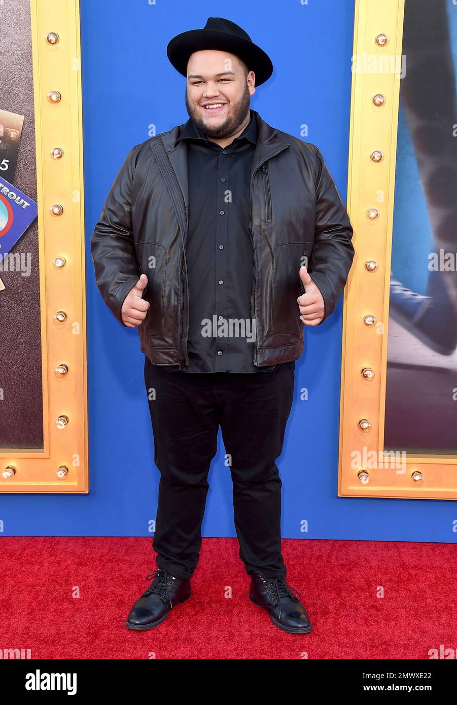 Christian Cuevas arrives at the world premiere of "Sing" at the ...