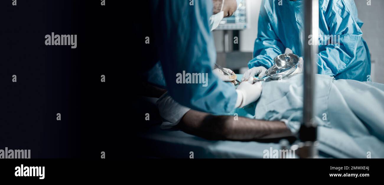 Surgery, teamwork and doctors in a hospital for an emergency life ...