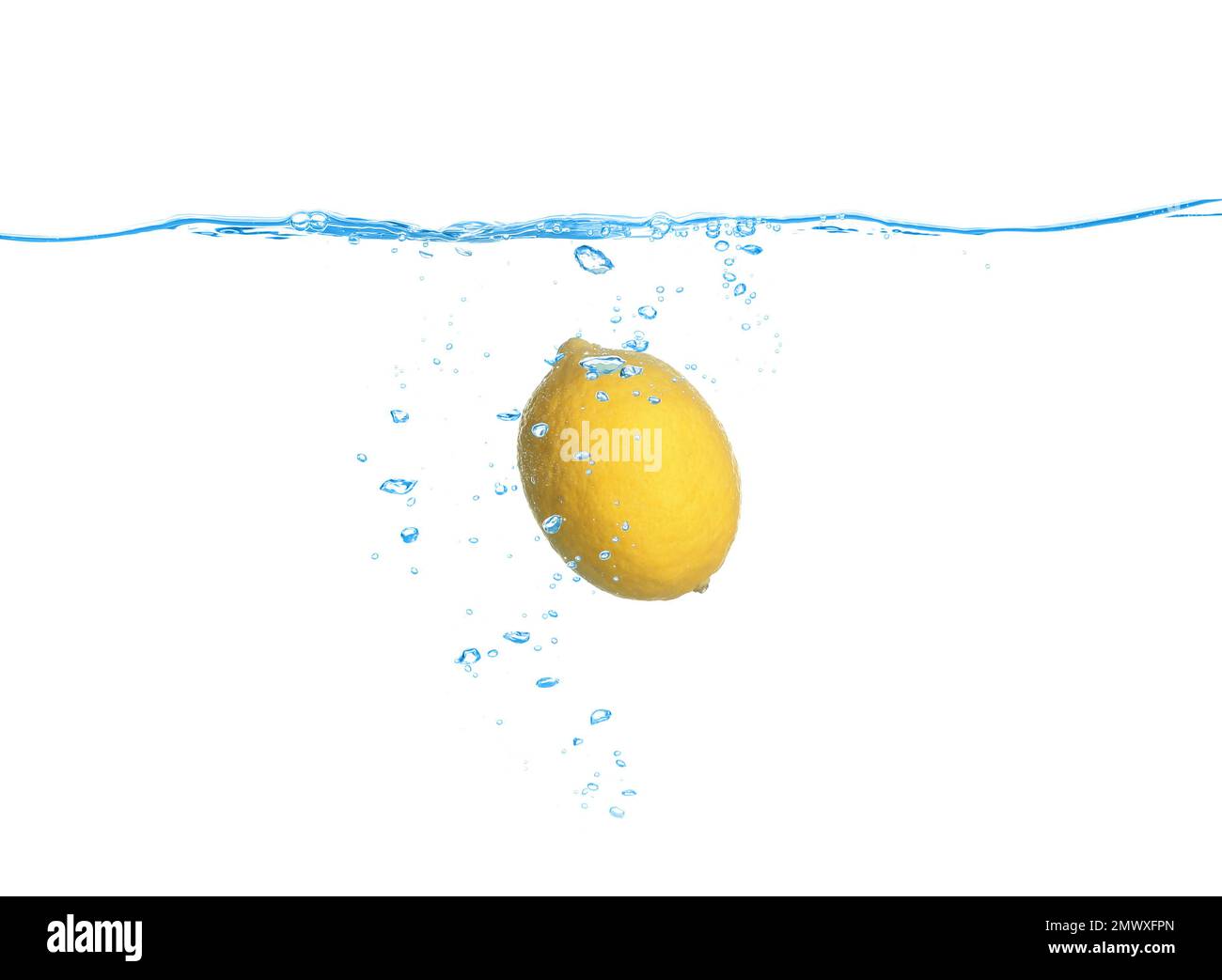 Ripe lemon falling down into clear water against white background Stock ...