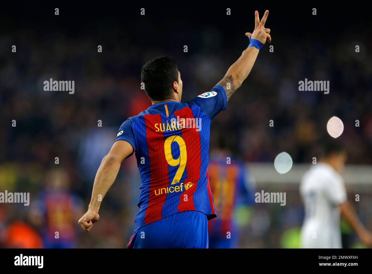 Barcelona's Luis Suarez celebrates after scoring the opening goal ...