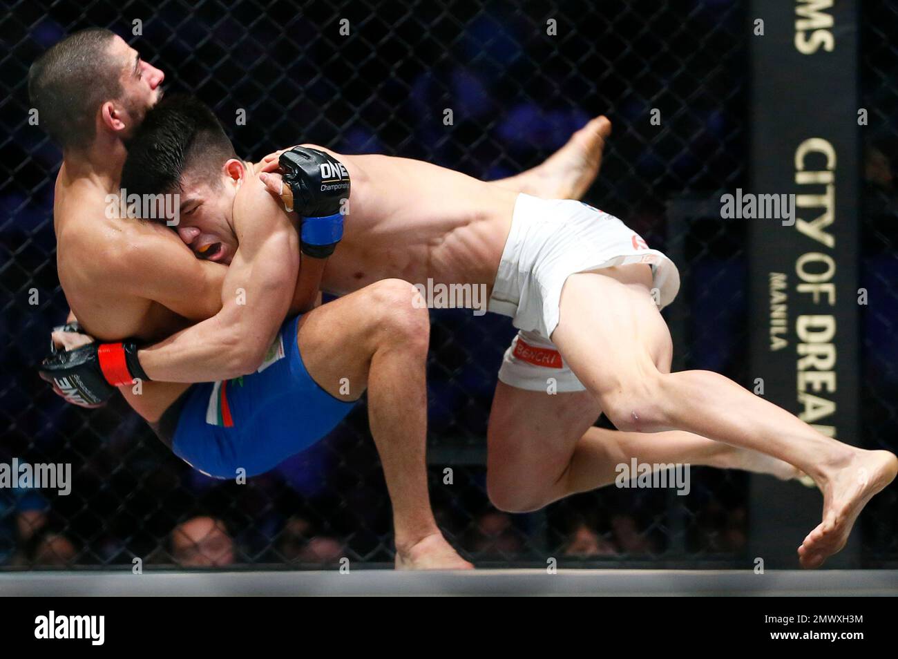 Mark Strieg, in white, of the Philippines and Sotir Kichukov of ...