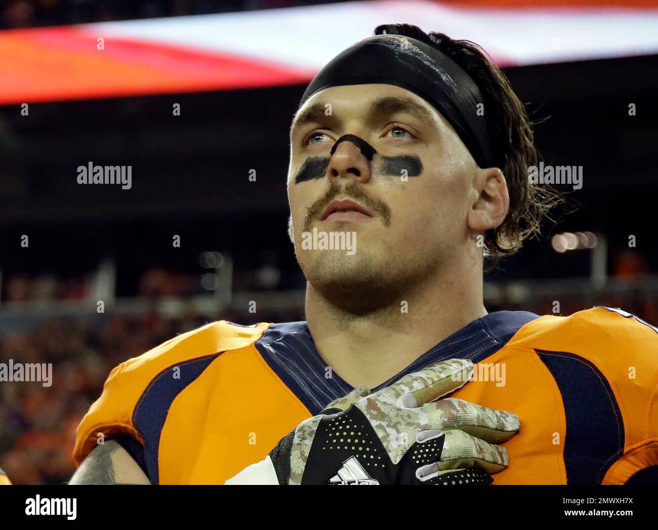 Denver Broncos defensive end Derek Wolfe looks on against the Kansas ...