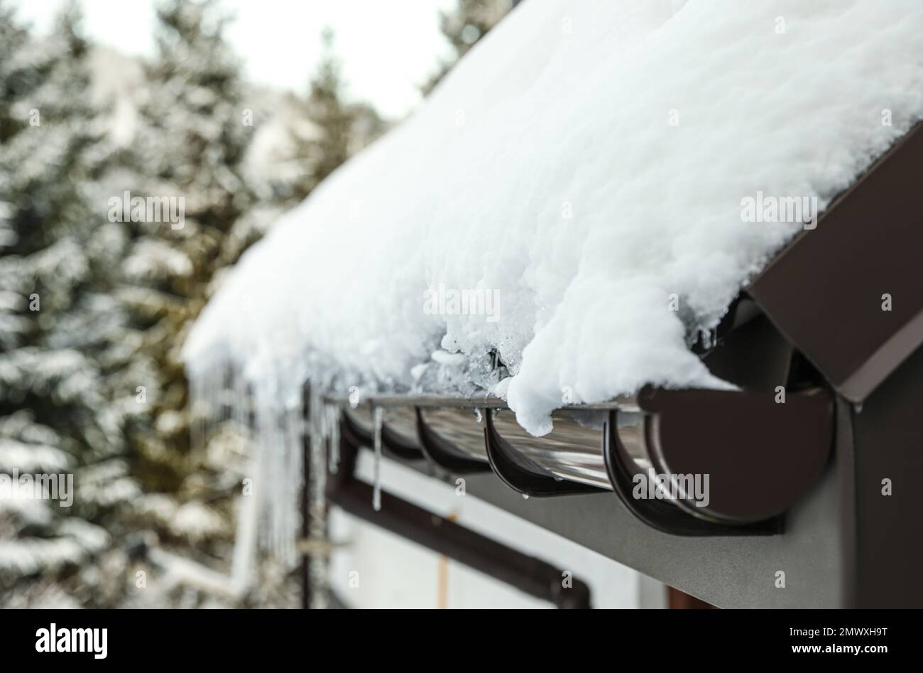 House roof covered with snow outdoors, closeup. Winter vacation Stock ...