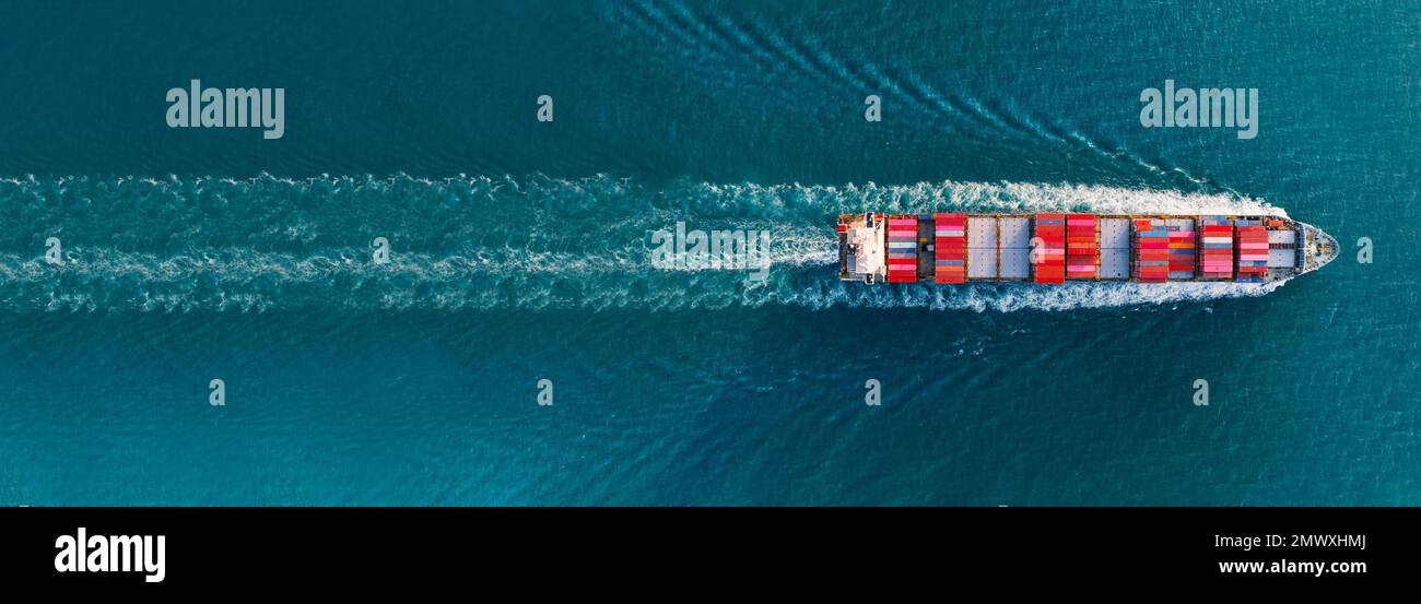 banner,Top view of cargo container ship carrying container and running ...