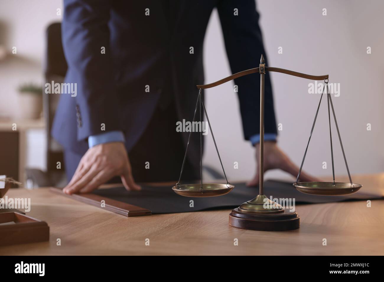 Scales justice in hands hi-res stock photography and images - Alamy