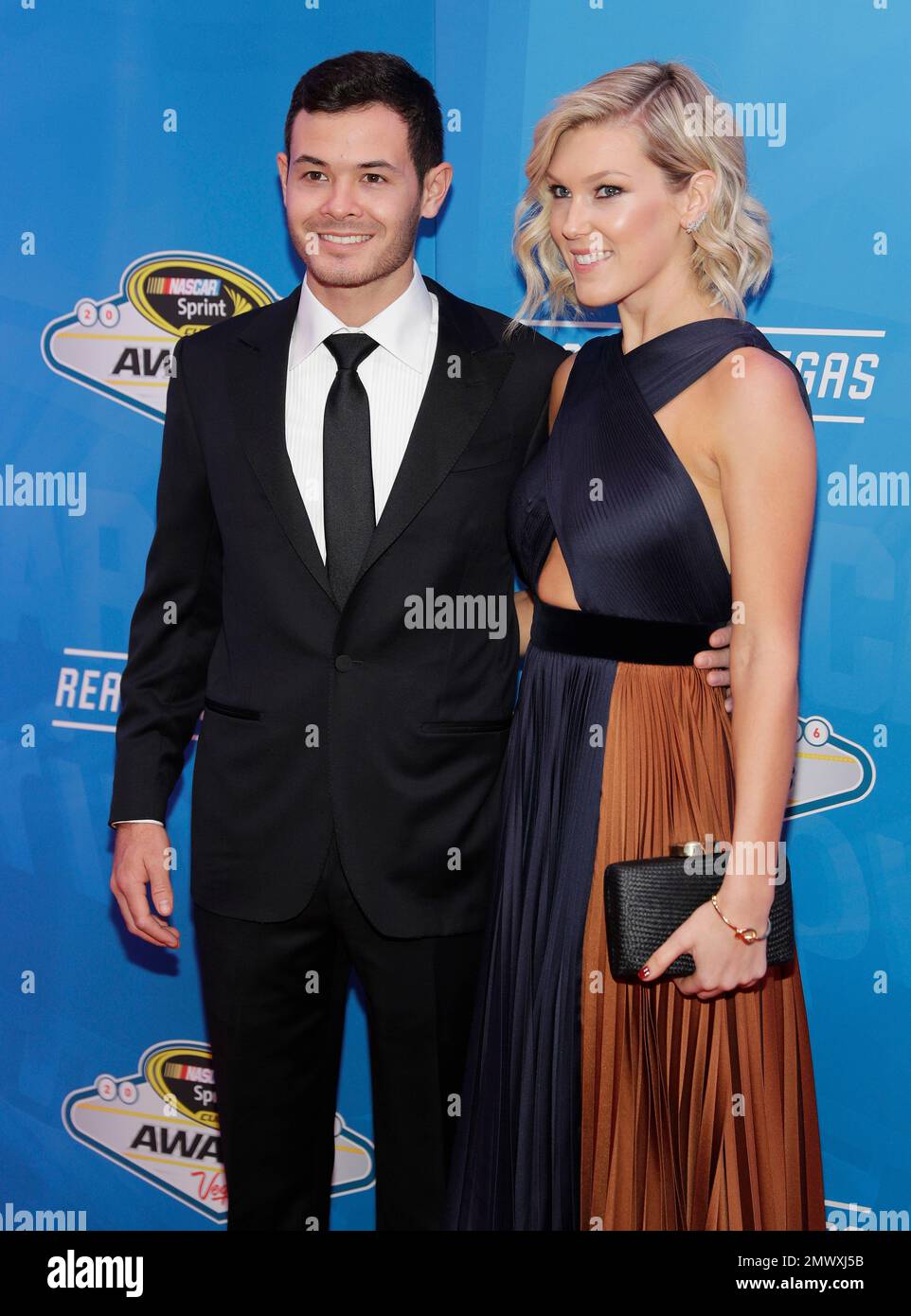 Kyle Larson, left, and his girlfriend, Katelynn Sweet, pose on the red ...