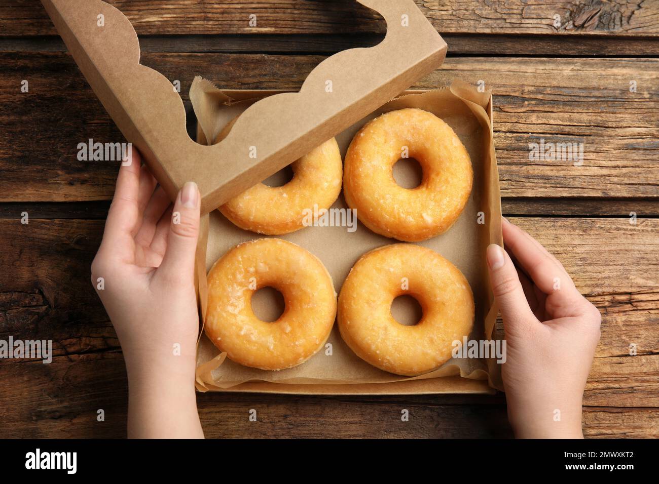 Woman donuts group hi-res stock photography and images - Alamy