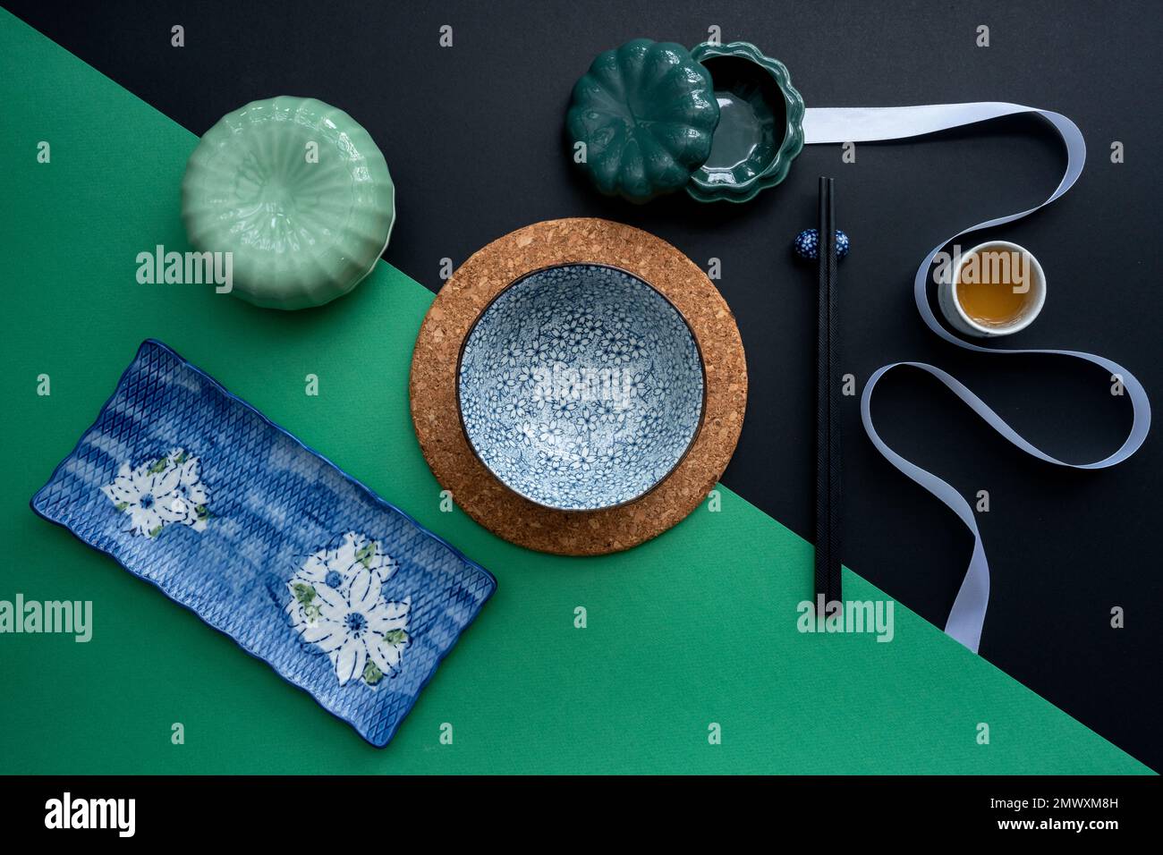 Japanese or Chinese table setting with traditional table mat and ...
