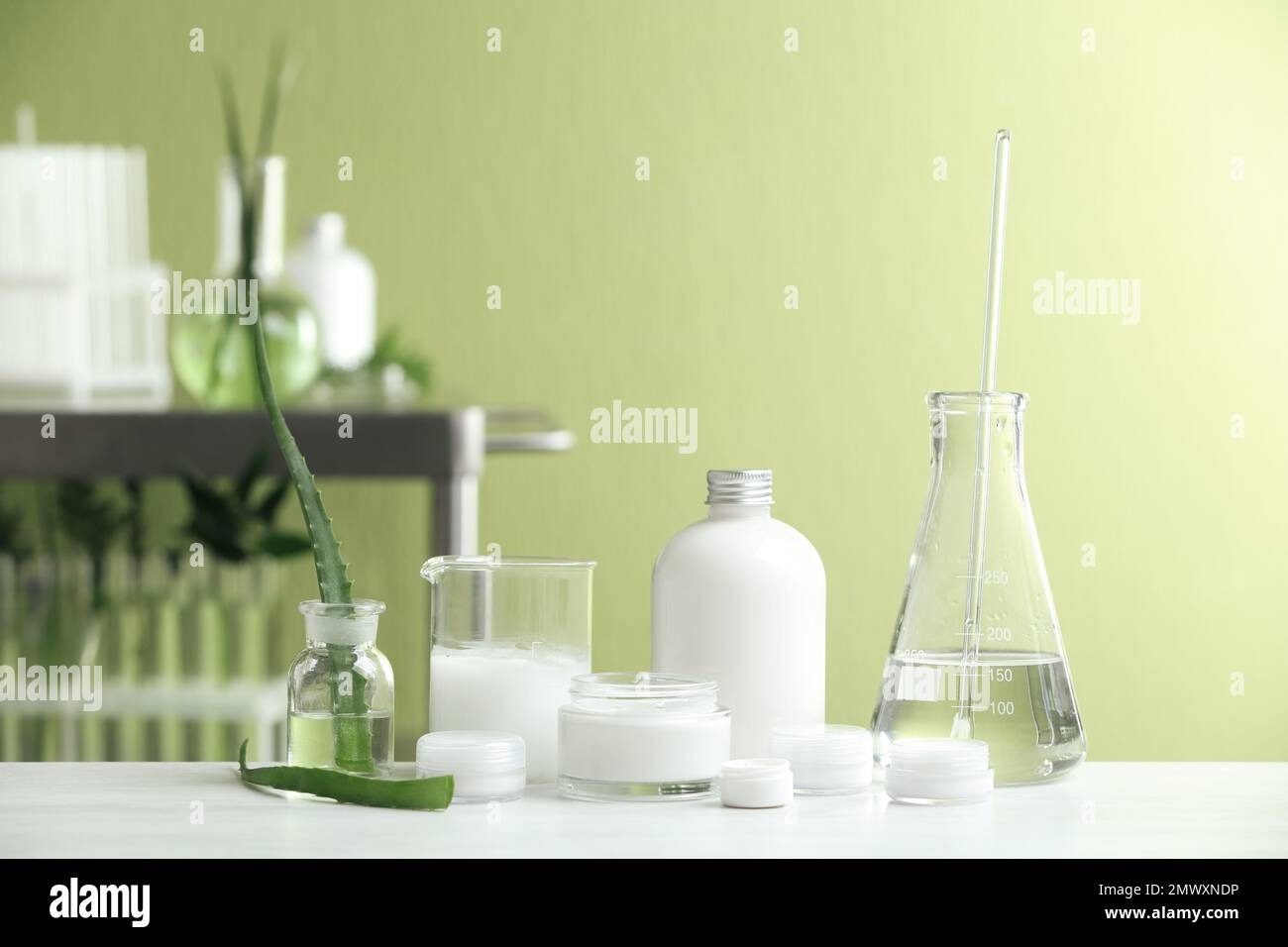 Composition with herbal cosmetic products and ingredients in laboratory ...