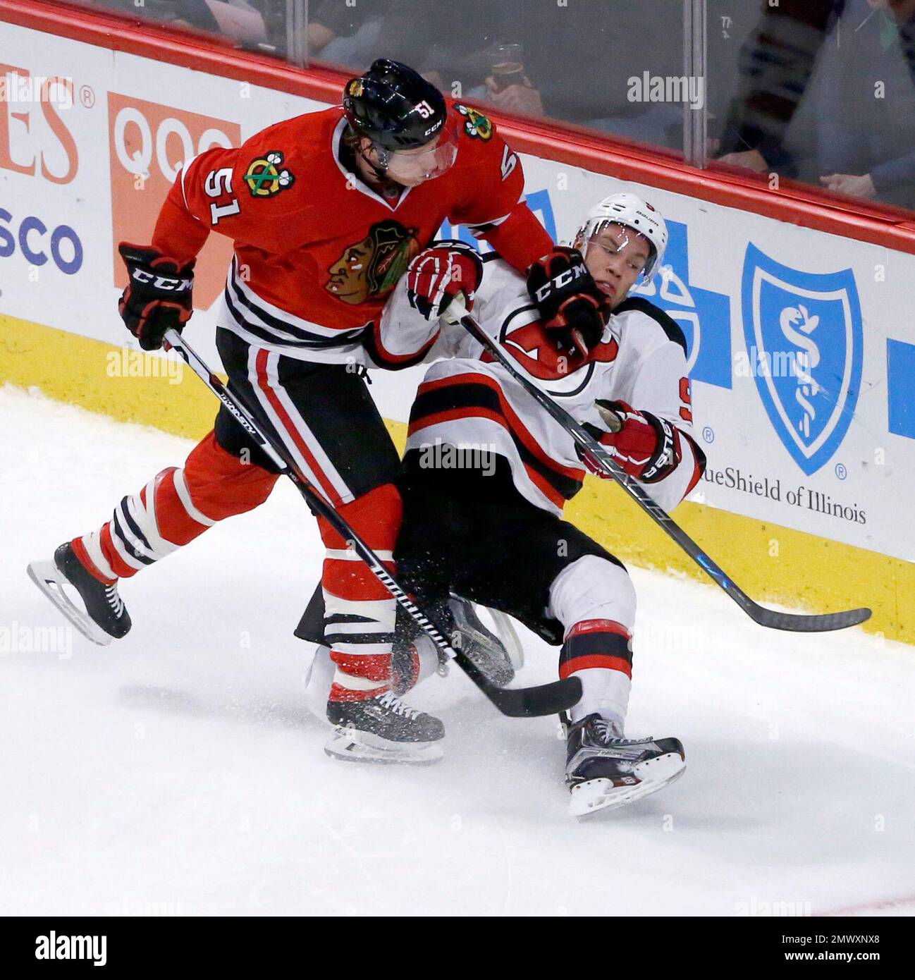 Chicago Blackhawks' Brian Campbell (51) checks New Jersey Devils ...