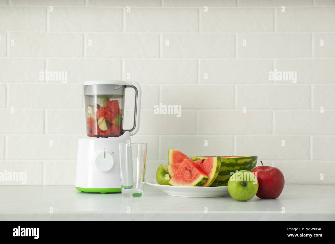 Blender and smoothie ingredients on counter in kitchen Stock Photo - Alamy