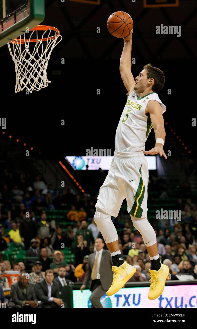 Baylor guard Jake Lindsey (3) goes up to dunk against Sam Houston State ...
