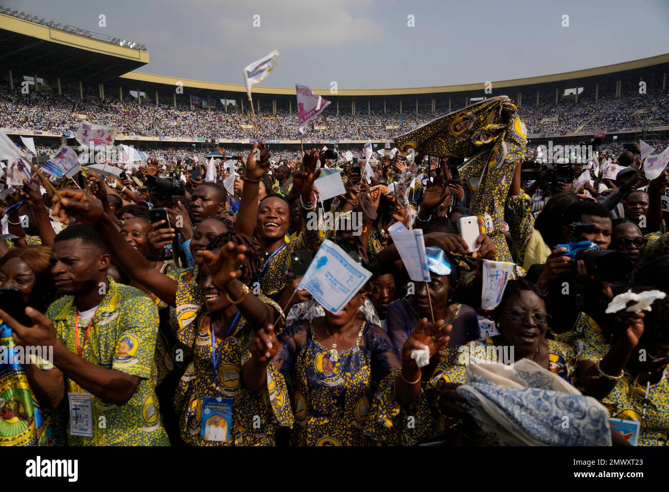 Faithful crowd the Martyrs' Stadium in Kinshasa, Democratic Republic of ...