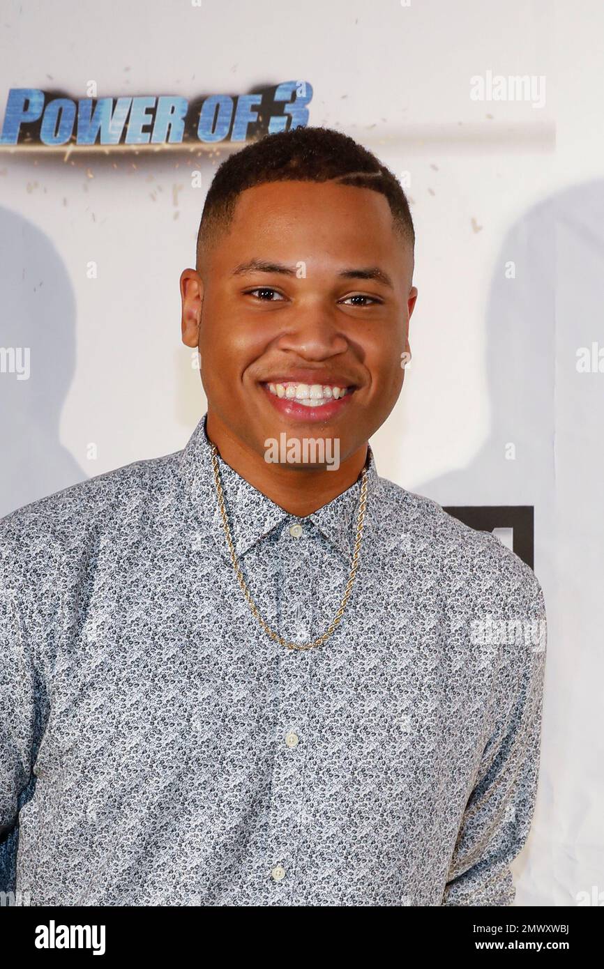 Aaron Cole arrives at the premiere of "Believe" at Regal Cinemas ...