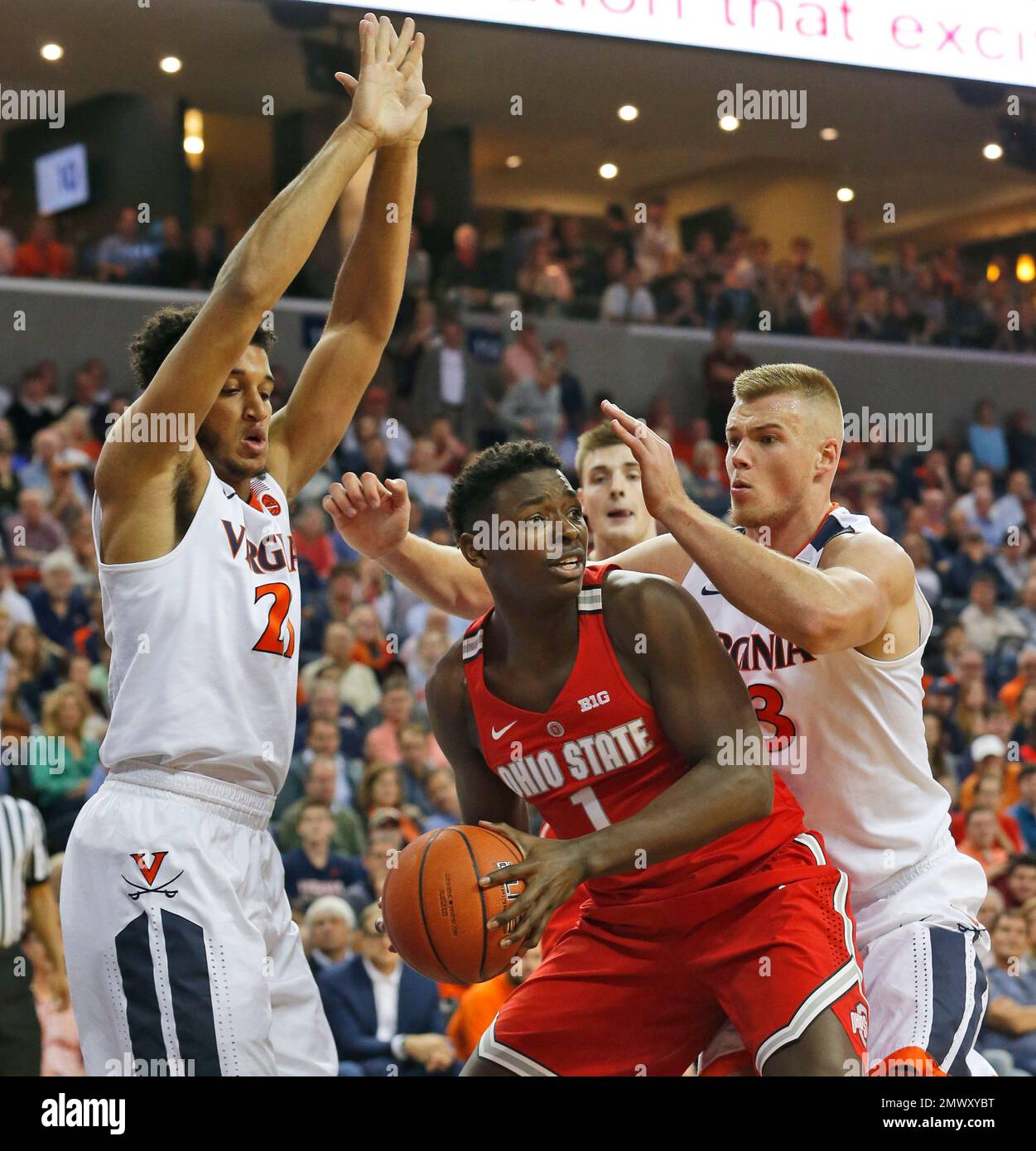 Ohio State forward Jae'Sean Tate (1) looks for help as he is pressured ...